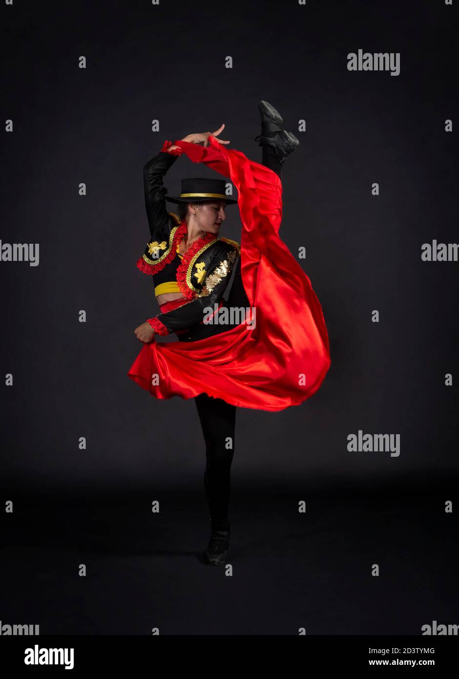 Plastic woman gracefully dancing in a stage costume stylized as a ...
