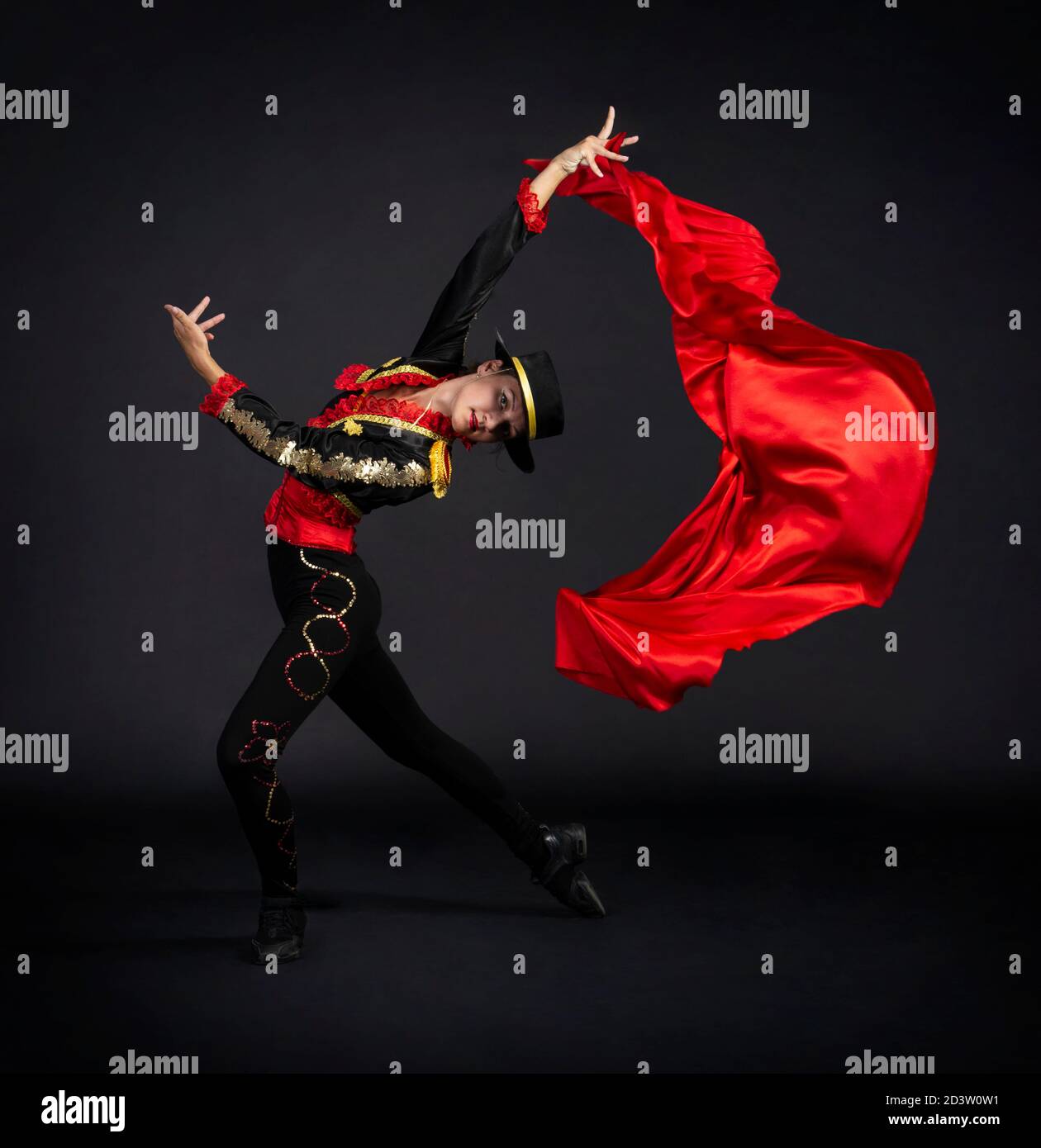 Plastic woman gracefully dancing in a stage costume stylized as a ...