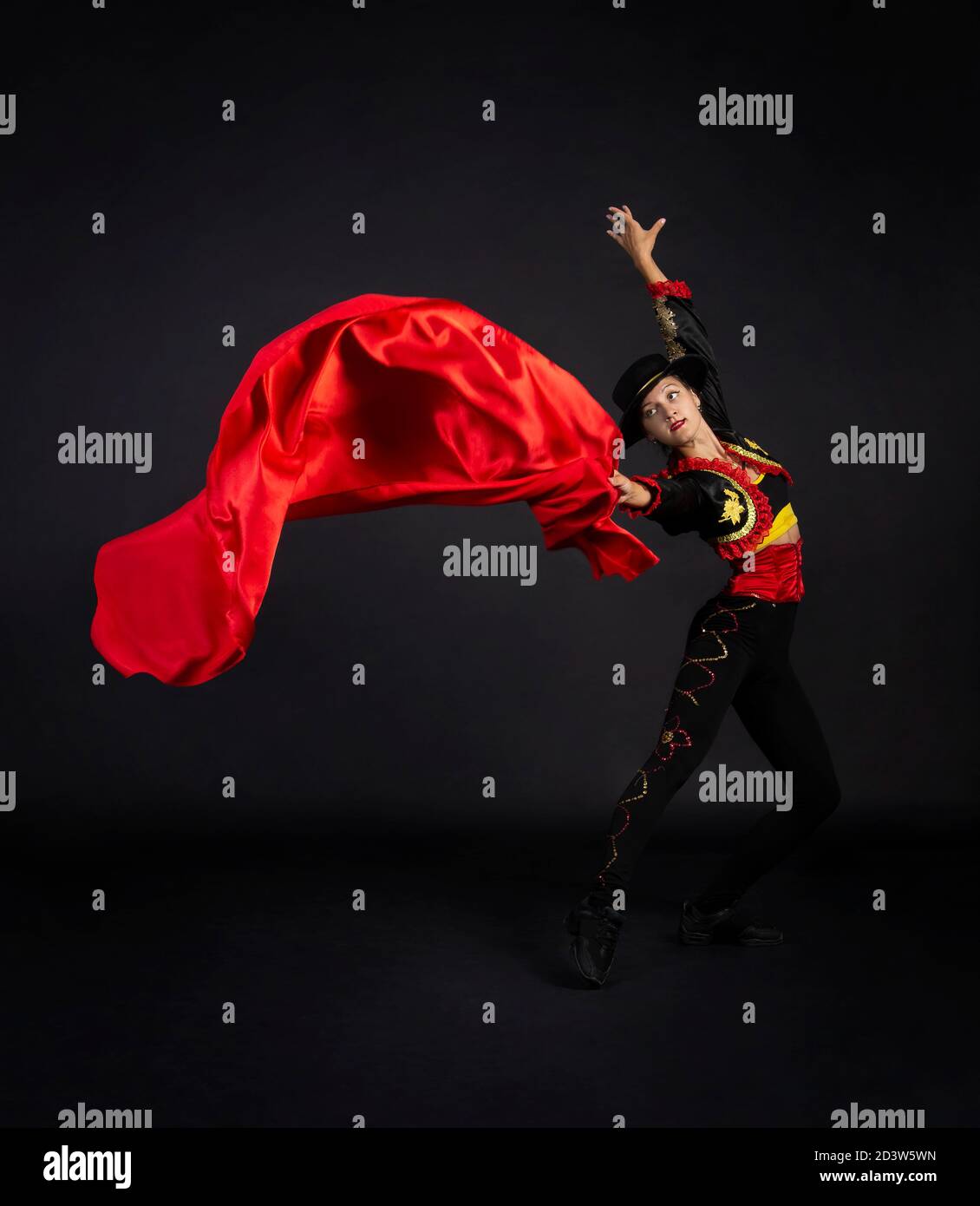 Plastic woman gracefully dancing in a stage costume stylized as a ...