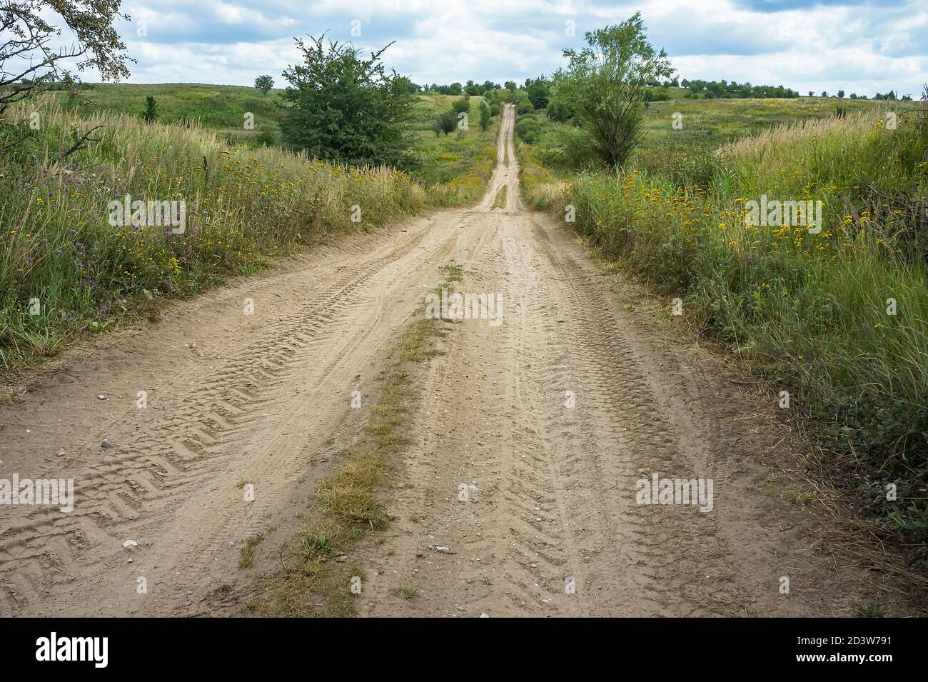 field dirt road, road outside the city in the fields Stock Photo - Alamy