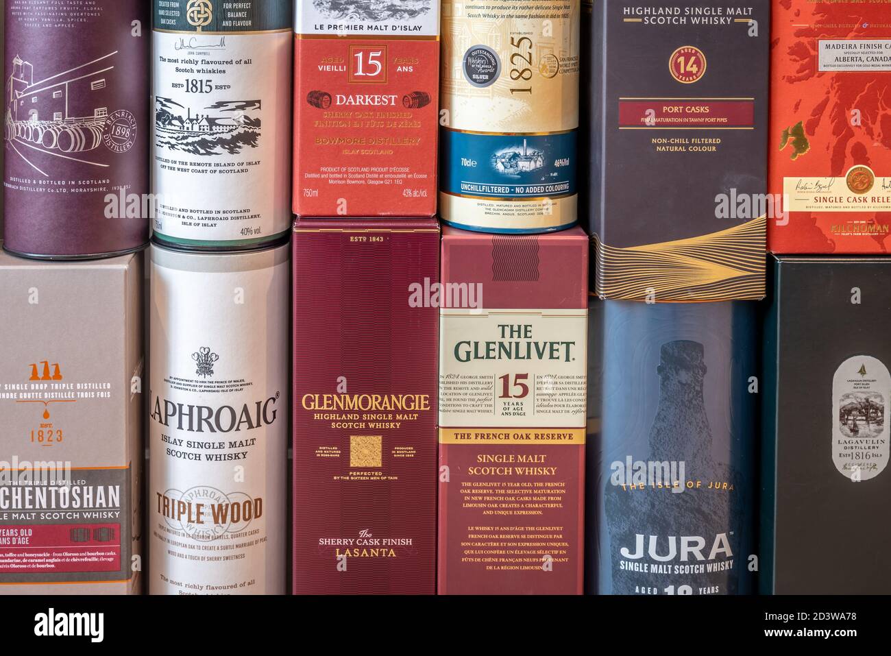 Miscellaneous scotch whisky presentation boxes stacked together to ...