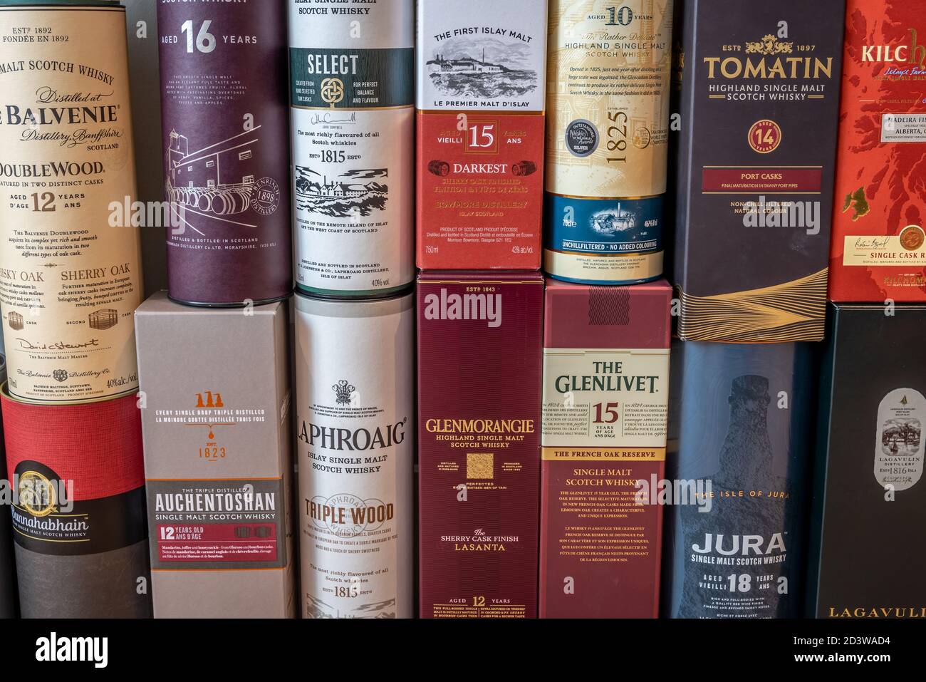 Miscellaneous scotch whisky presentation boxes stacked together to ...