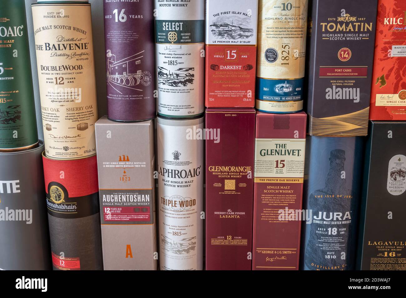 Miscellaneous scotch whisky presentation boxes stacked together to ...