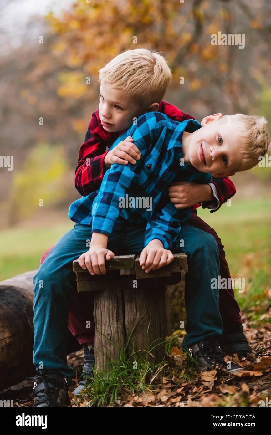 Two brothers hugging other hi-res stock photography and images - Alamy