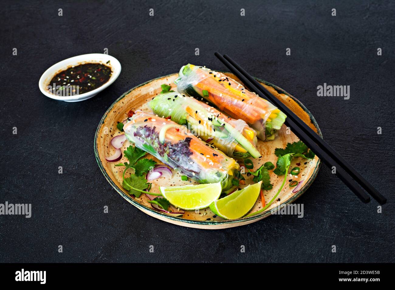 Fresh Asian appetizer Spring rolls (Nem) made from rice paper and raw ...