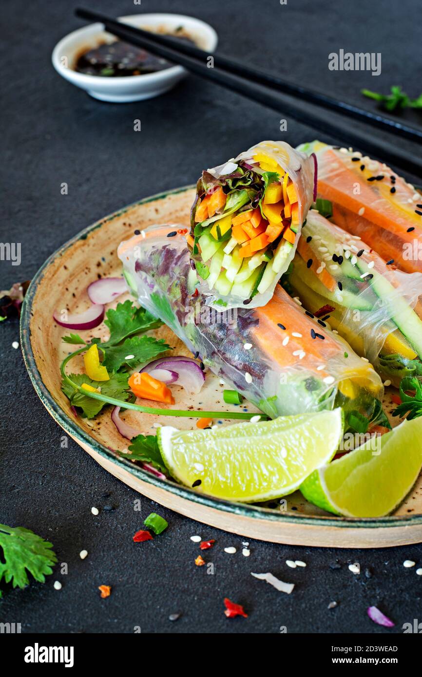 Fresh Asian appetizer Spring rolls (Nem) made from rice paper and raw ...