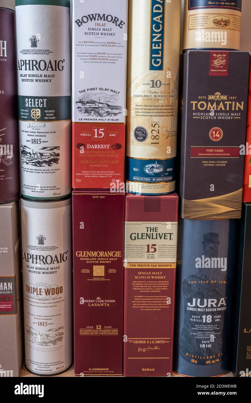 Miscellaneous scotch whisky presentation boxes stacked together to ...