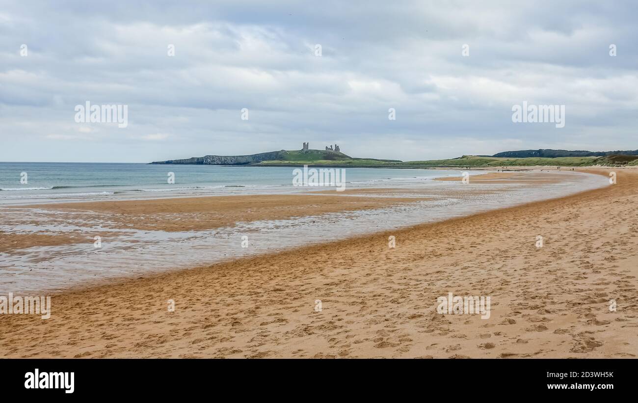 Dunstanburgh castle beach hi-res stock photography and images - Alamy