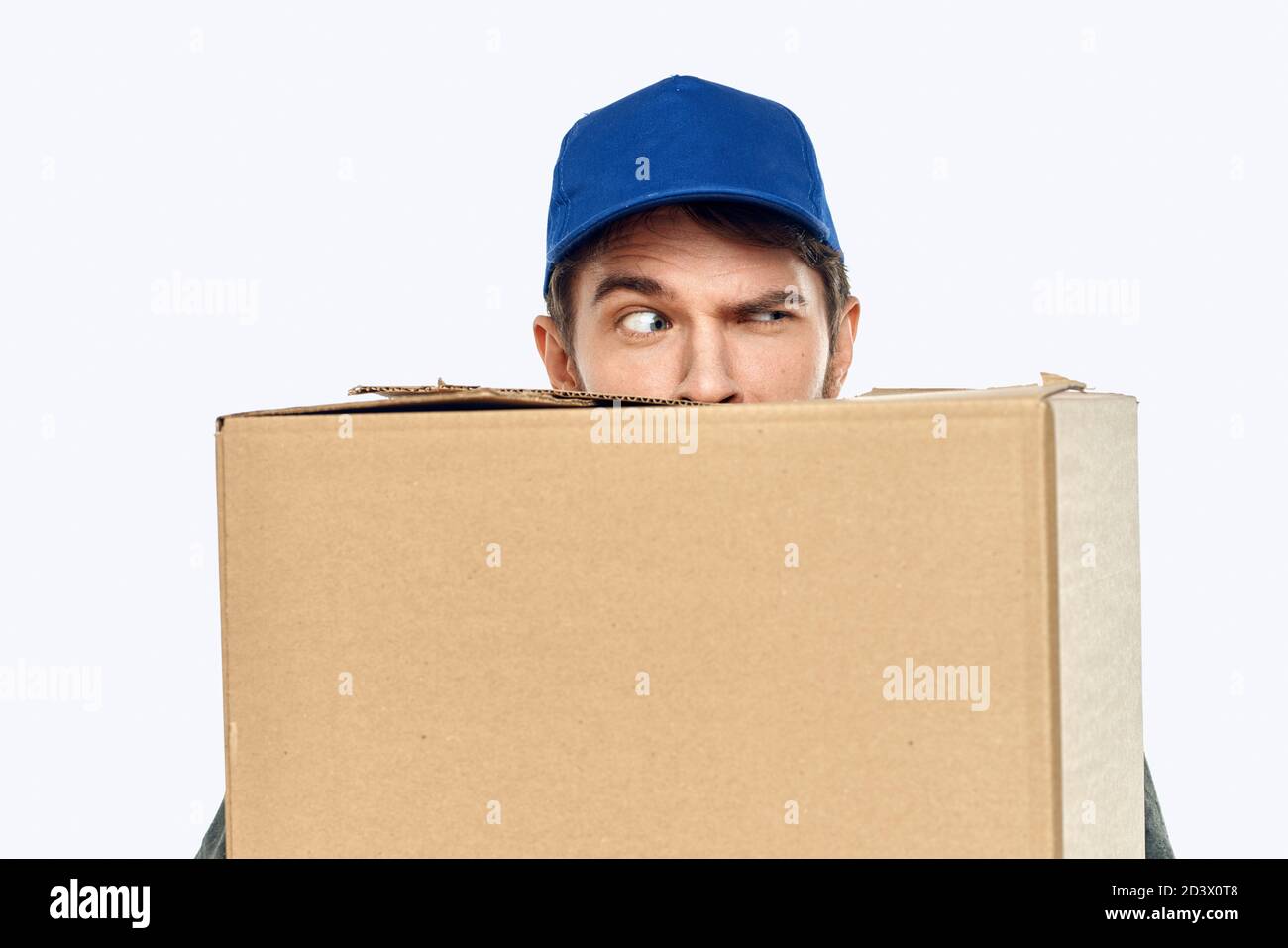 Working man with boxes in hands delivery service work lifestyle Stock ...