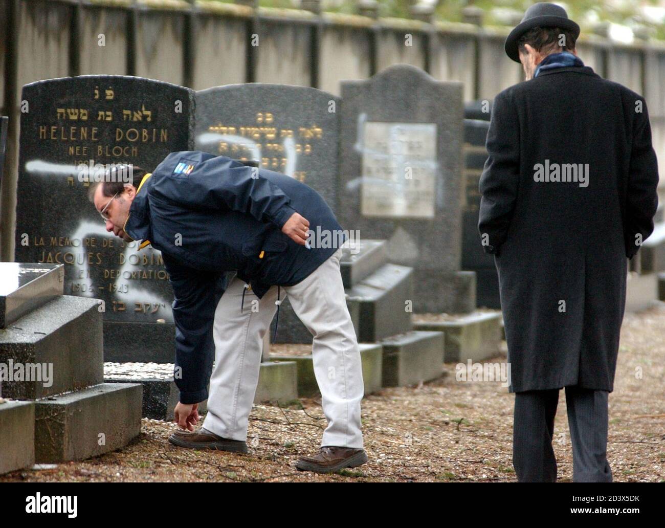 Swastikas on grave hi-res stock photography and images - Alamy
