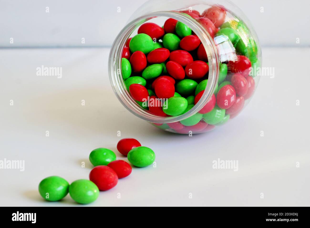 Green and red Christmas candy in a glass jar Stock Photo - Alamy