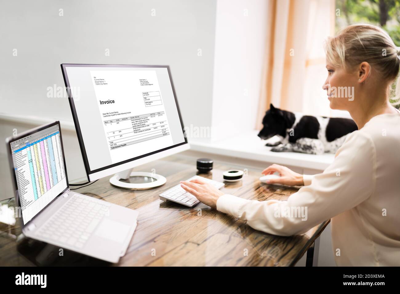 Tax Invoice And Spreadsheet Software On Office Computer Stock Photo - Alamy