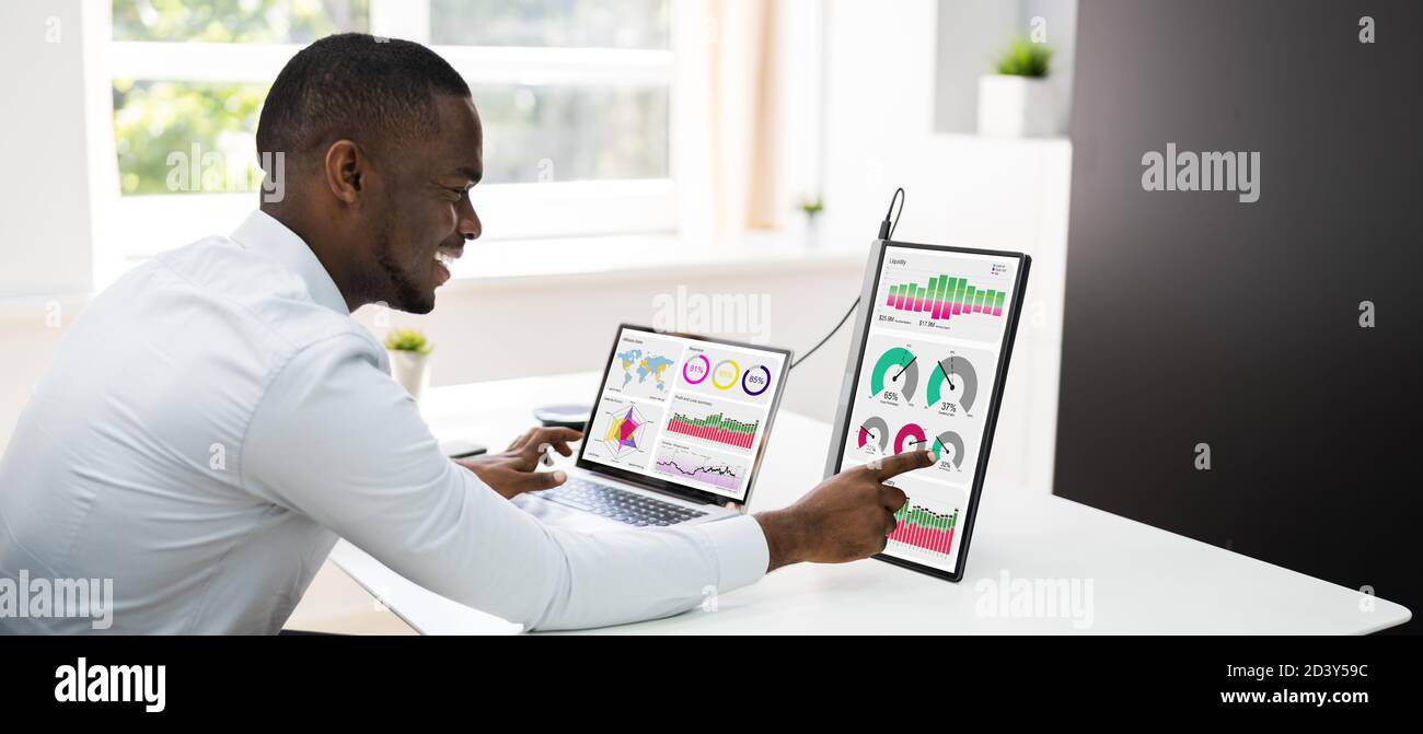 Predictive Business Analytics. African American Analyst Using Computer ...