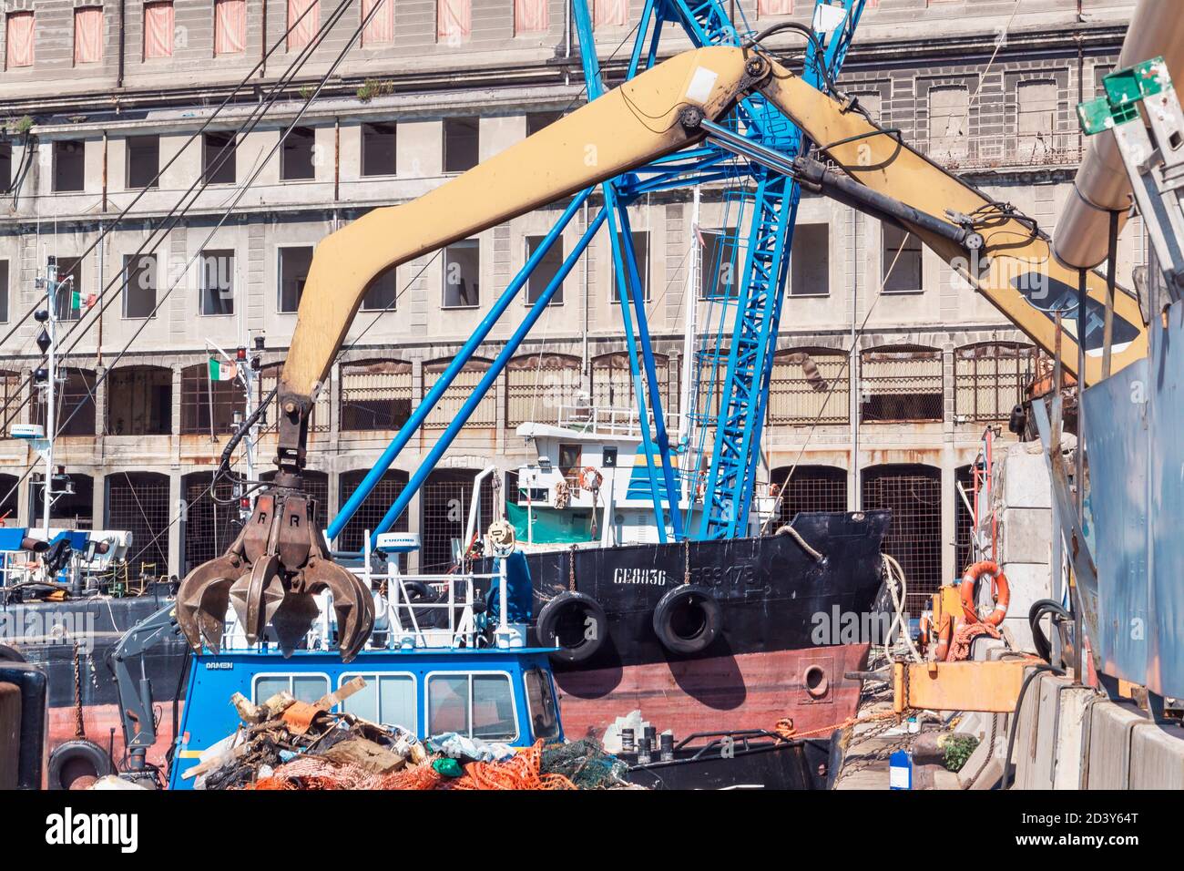 A garbage collection boat, Genoa, Liguria, Italy, Europe Stock Photo ...