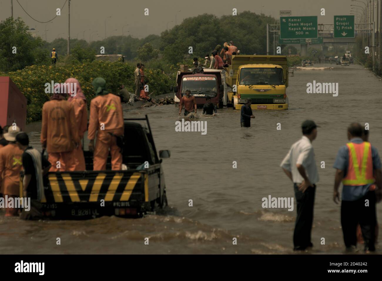 Torrential rain flooding the coastal area of Jakarta, including an ...