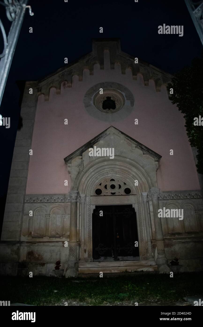 Close-up to the entry of the crypt in black during night time Stock ...