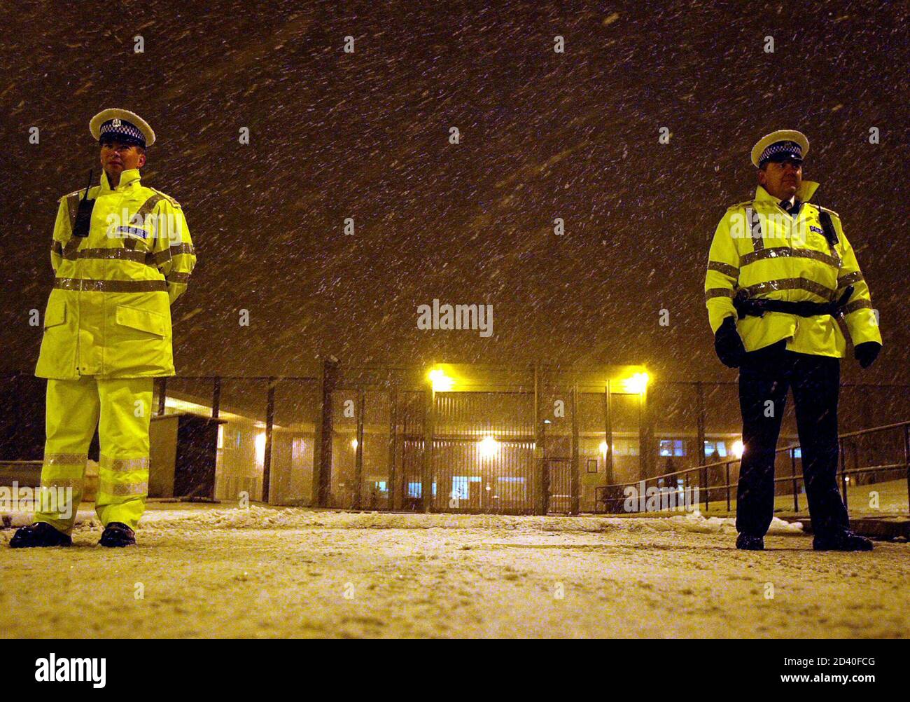 Prison guard two prisoners in hi-res stock photography and images - Alamy
