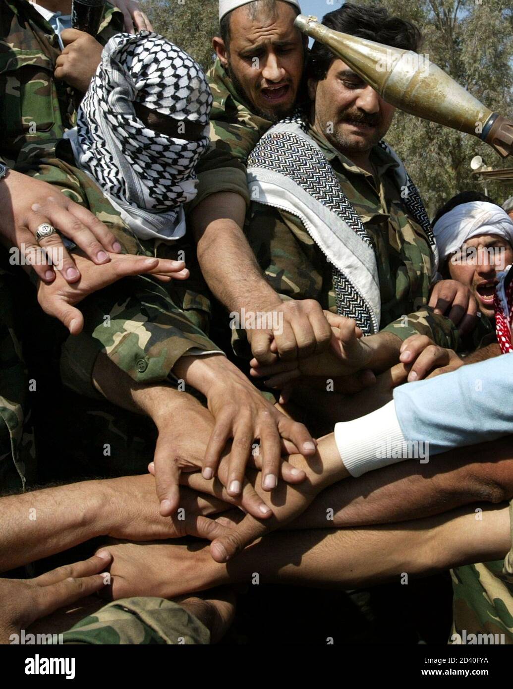 Baghdad iraq hands victory hi-res stock photography and images - Alamy