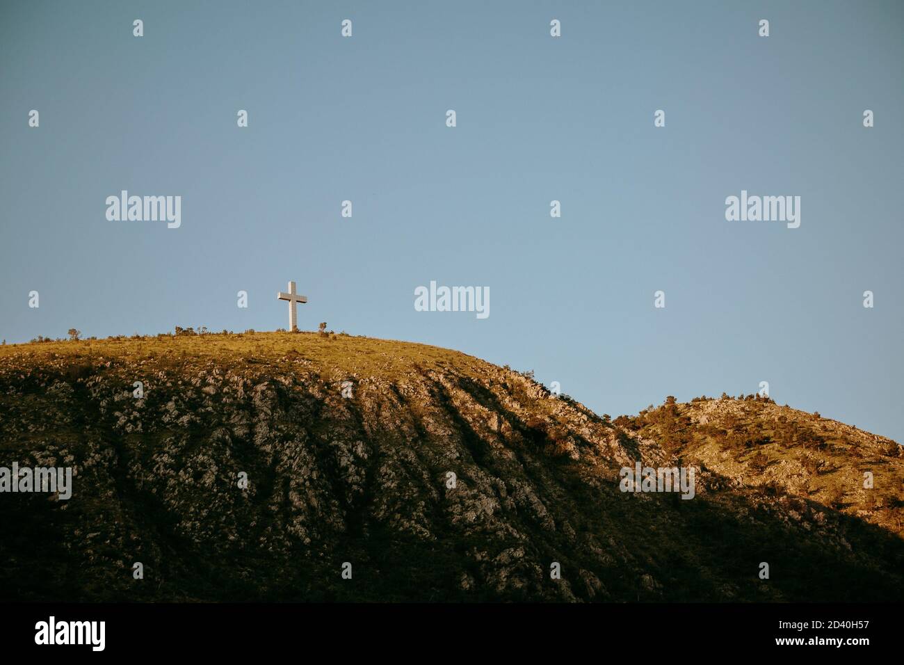 Tall cross statue on top of a hill in Mostar, Bosnia and Herzegovina ...