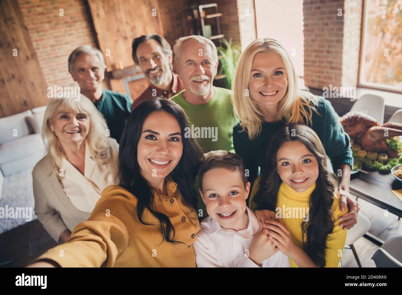 Closeup portrait photo of full family gathering eight people cuddle ...