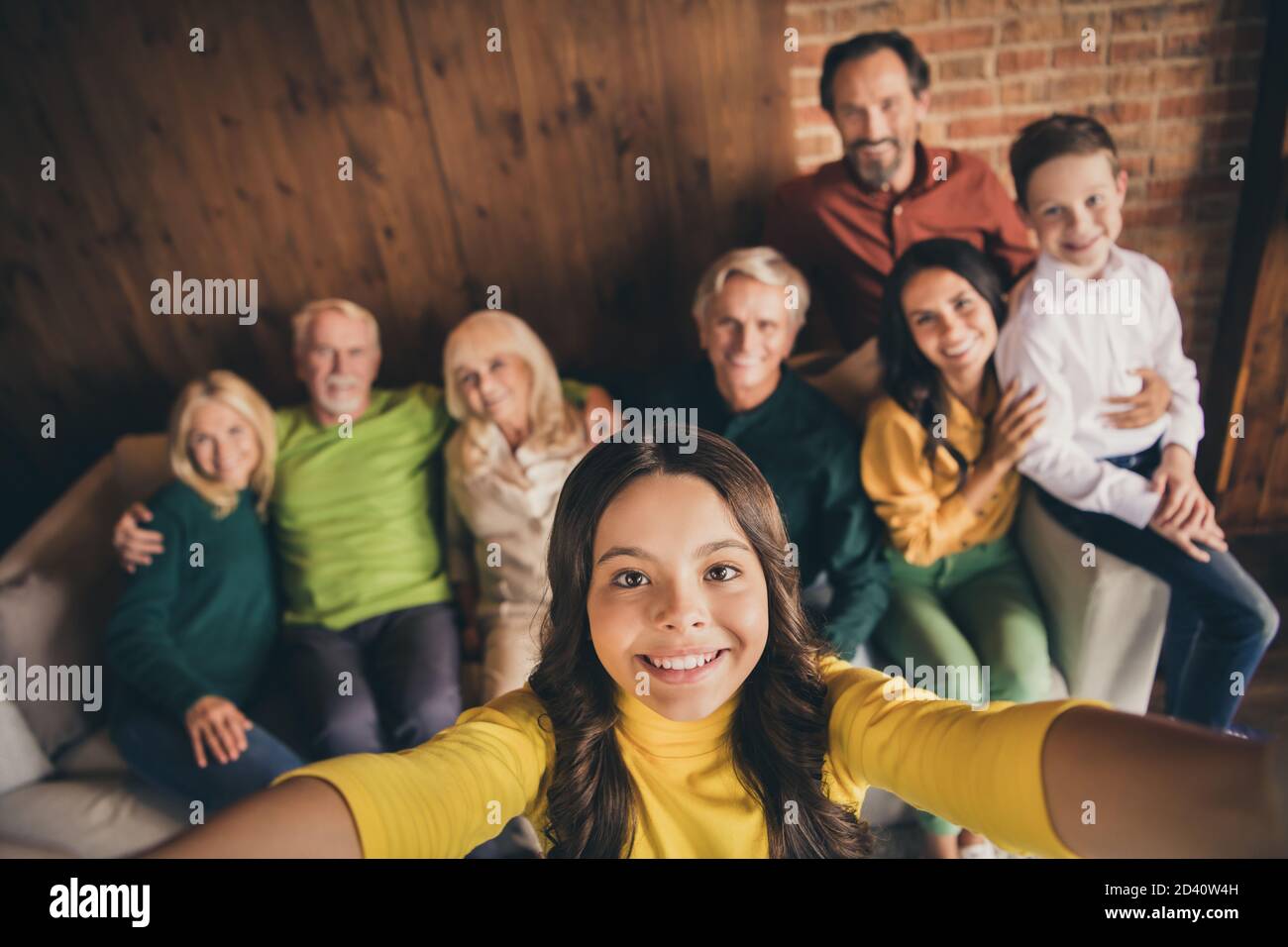 Closeup portrait photo of big full family eight people gathering cuddle ...