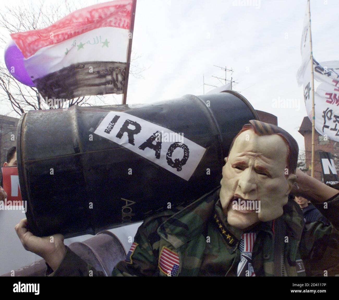 Wearing george bush mask hi-res stock photography and images - Alamy