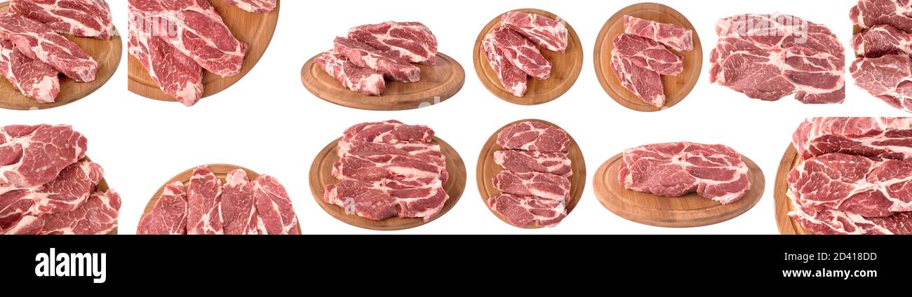 Raw sliced pork meat on a wooden board, isolated on white background ...