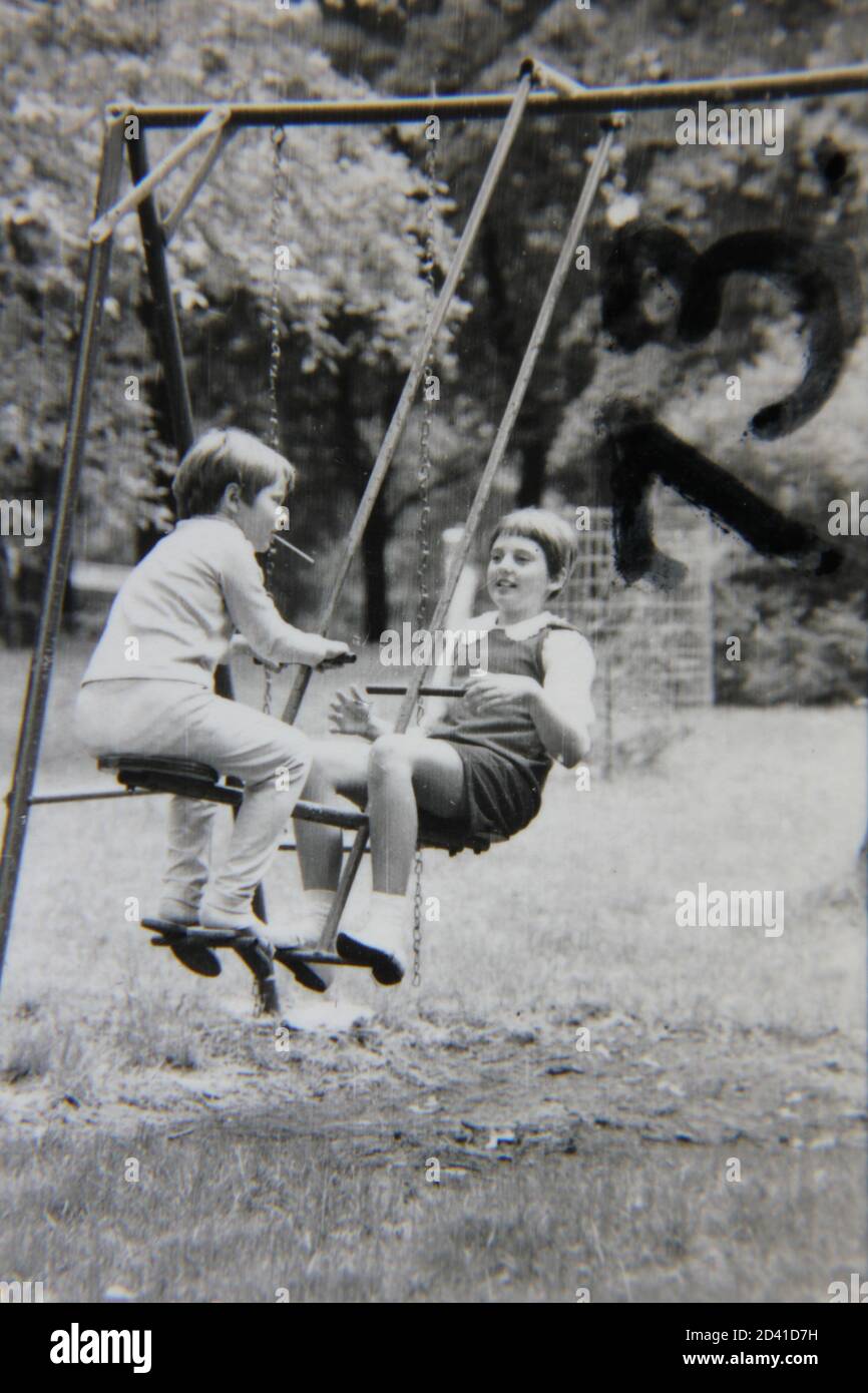 1970s children playing park hi-res stock photography and images - Alamy