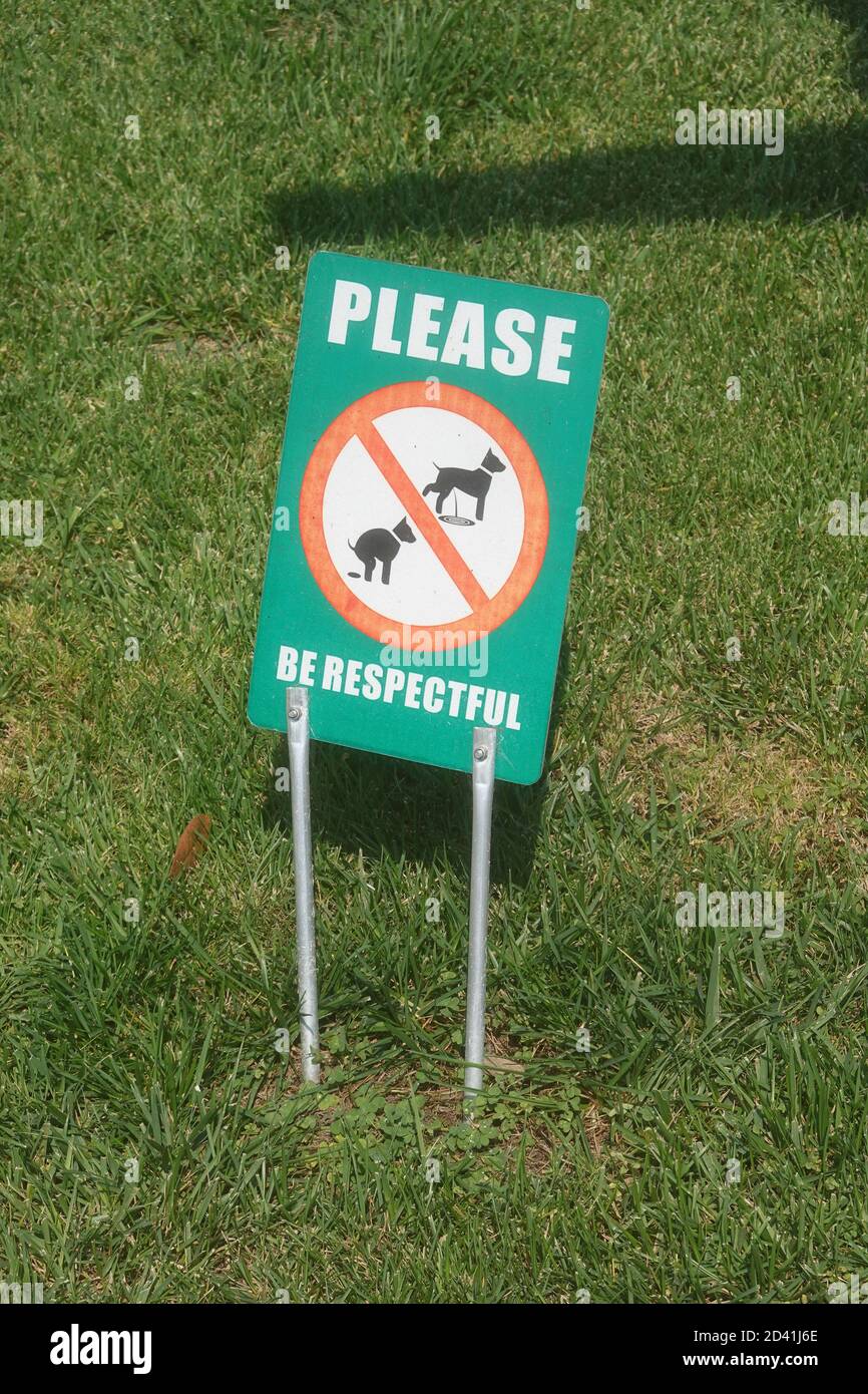 Please be respectful when walking your dog sign. No dog poop sign Stock ...