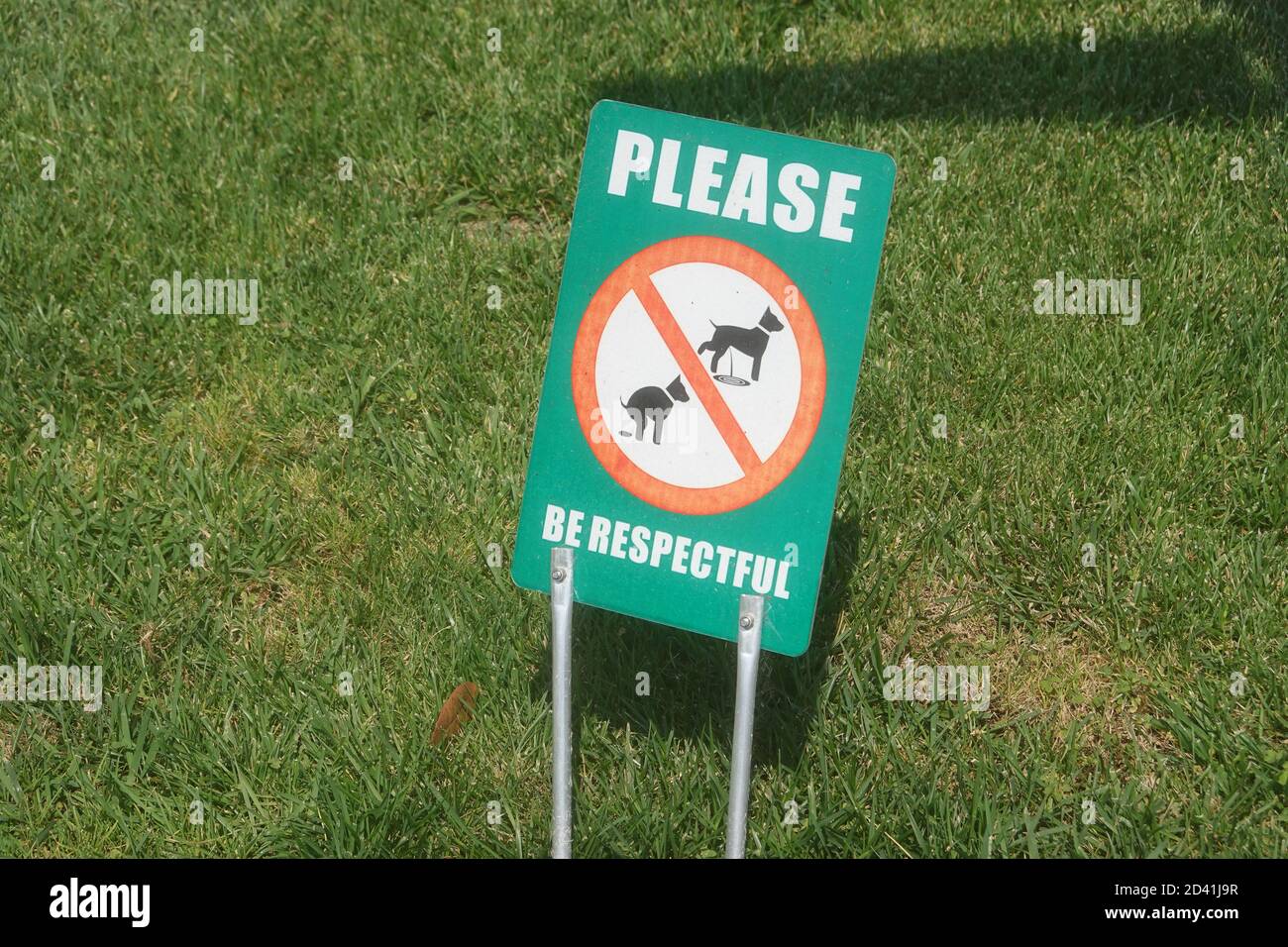 Please be respectful when walking your dog sign. No dog poop sign Stock ...