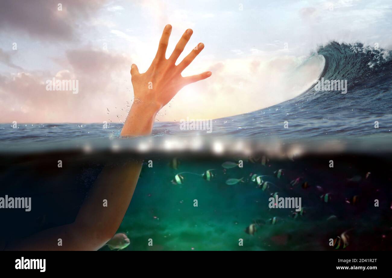 Hand of person drowning in water at sea Stock Photo - Alamy