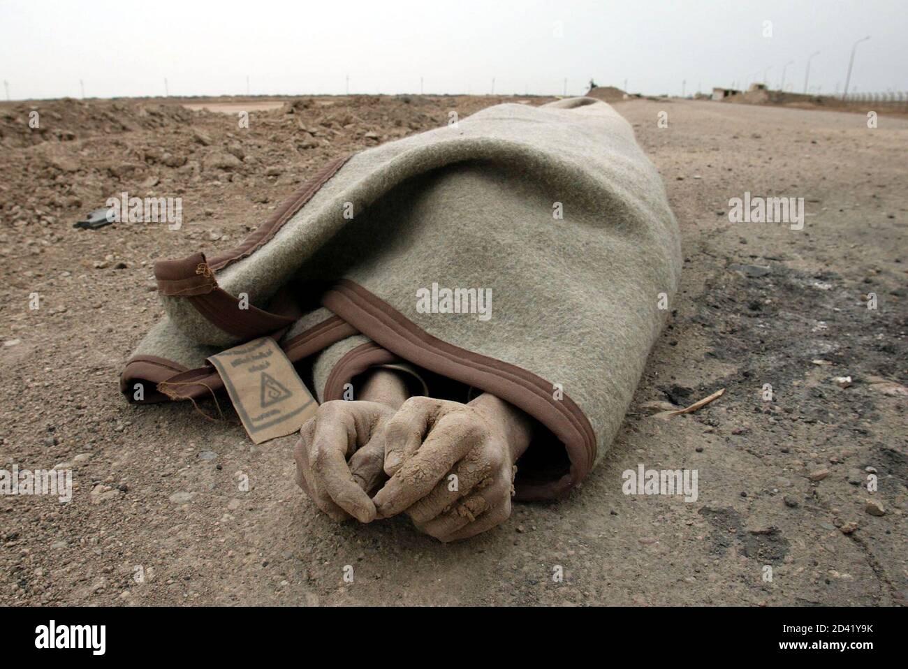The Body Of An Iraqi Soldier Lies Wrapped In Blanket High Resolution ...