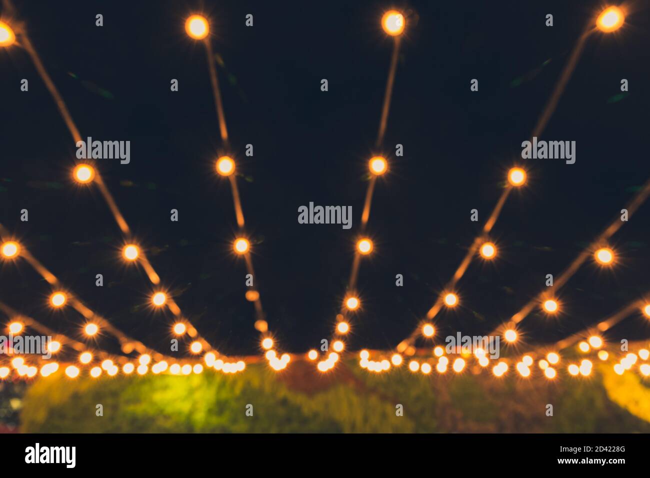 Festoon vintage light bulb string carnival Stock Photo - Alamy
