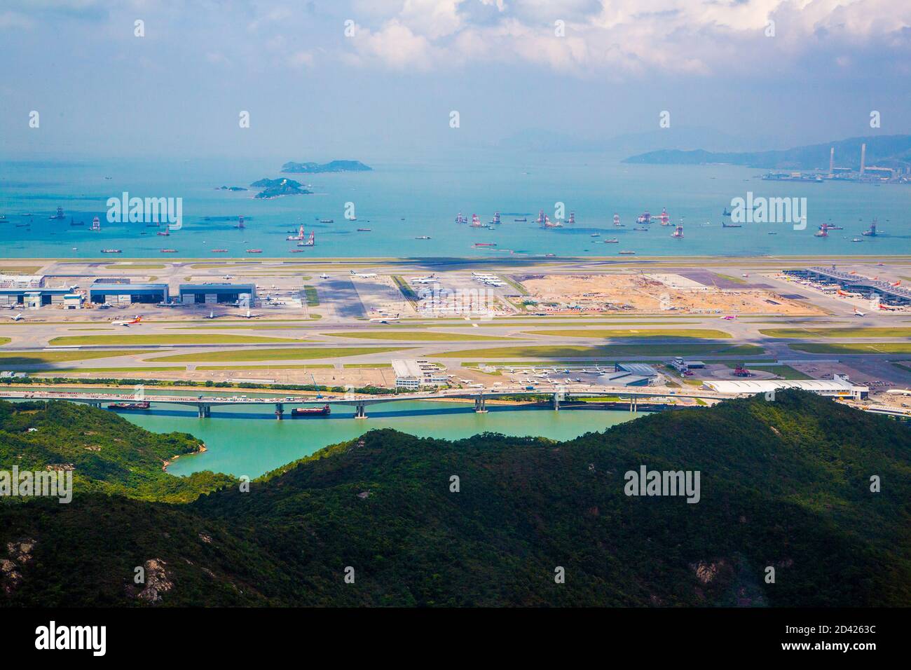 Aerial view of the Lantau island bridge and the ocean in Hong Kong on a ...