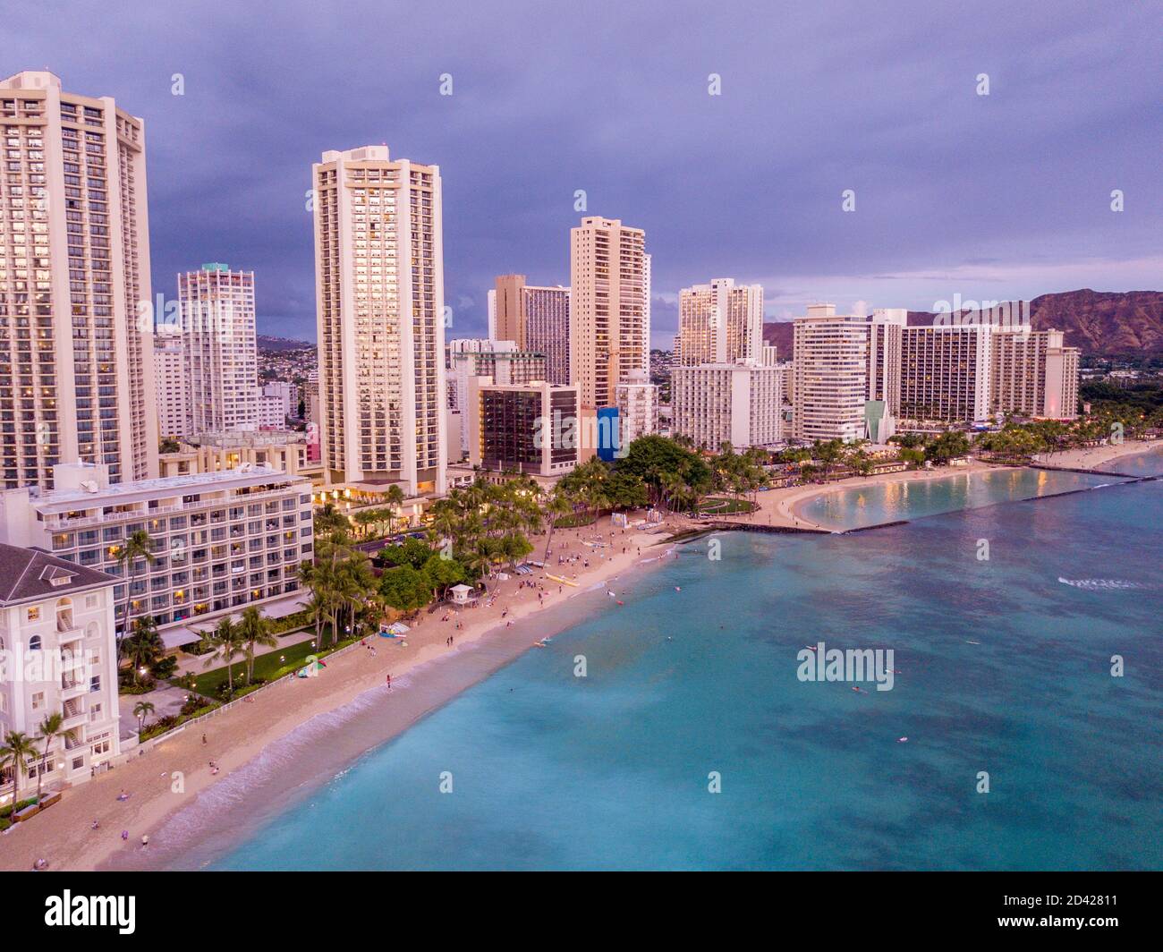 Aerial view from above on the Honolulu city skyline on a cloudy day ...