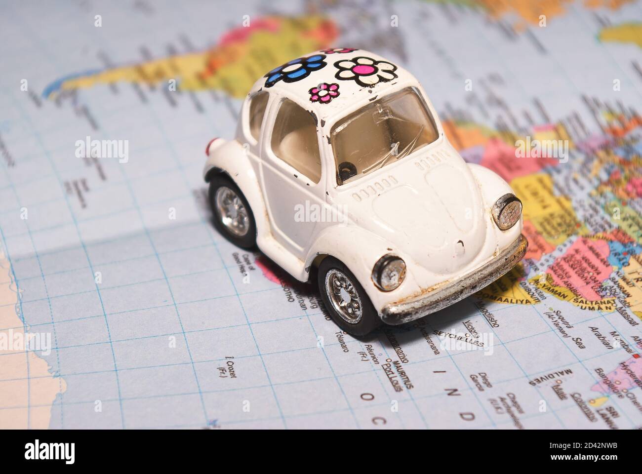 Travel concept. Small toy car on the travel map Stock Photo - Alamy