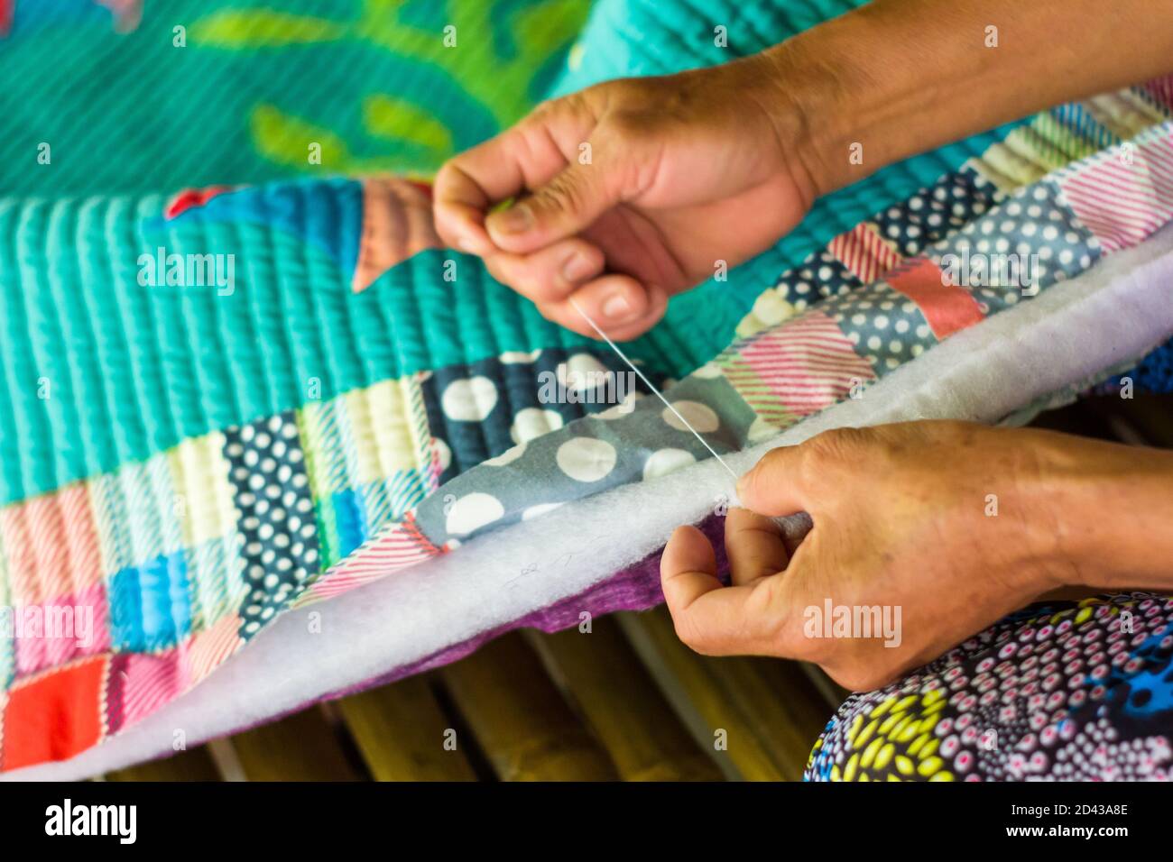 Quilt making in Caohagan Island off Cebu in the Phlippines Stock Photo ...