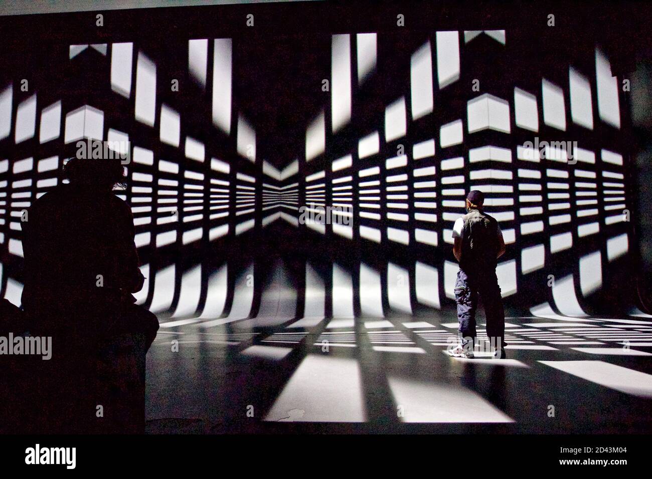 Beijing, Netherlands. 8th Oct, 2020. Visitors look at the installation ...