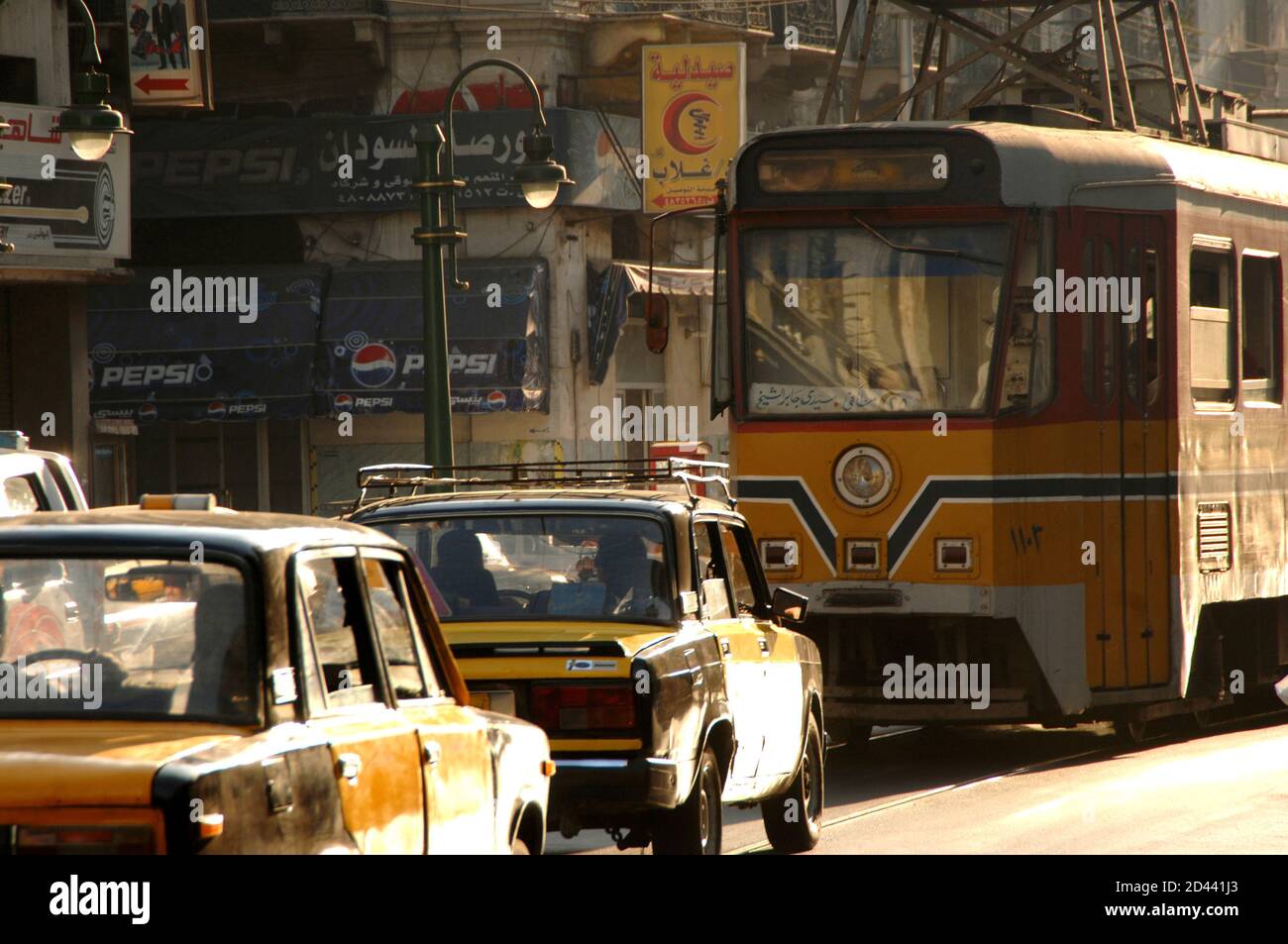 A tram in busy Alexandria traffic, Egypt Stock Photo - Alamy