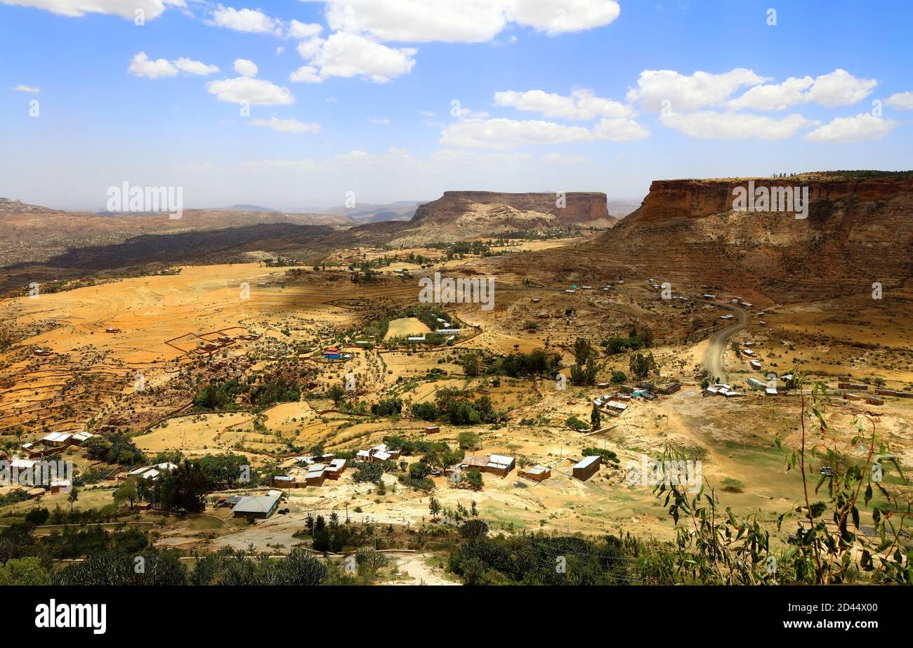 The arid valley below and table-top mountains surrounding the isolated ...