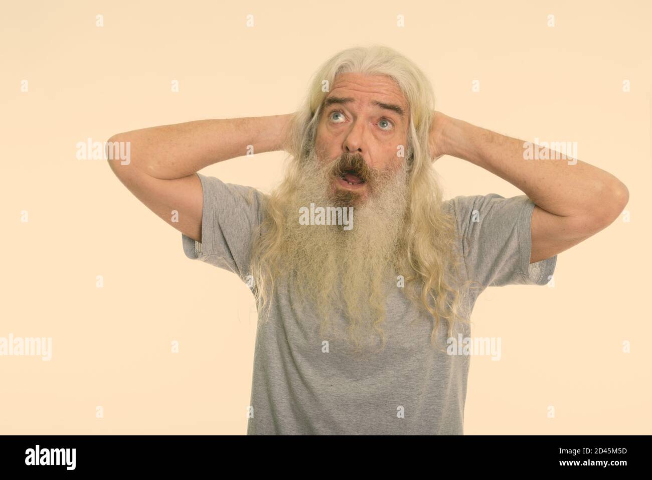 Old man looking shocked hands on head hi-res stock photography and ...