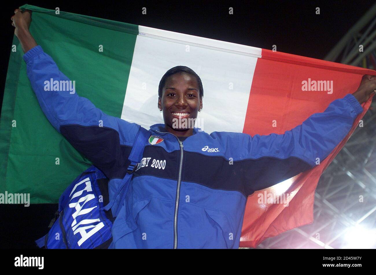 FIONA MAY OF ITALY HOLDS HER COUNTRY'S FLAG AS SHE CELEBRATES HER ...