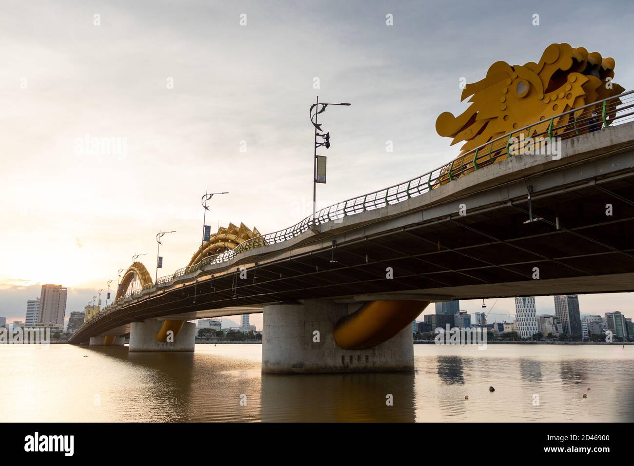 View of the famous Dragon Bridge in Da Nang, Vietnam with thin clouds ...