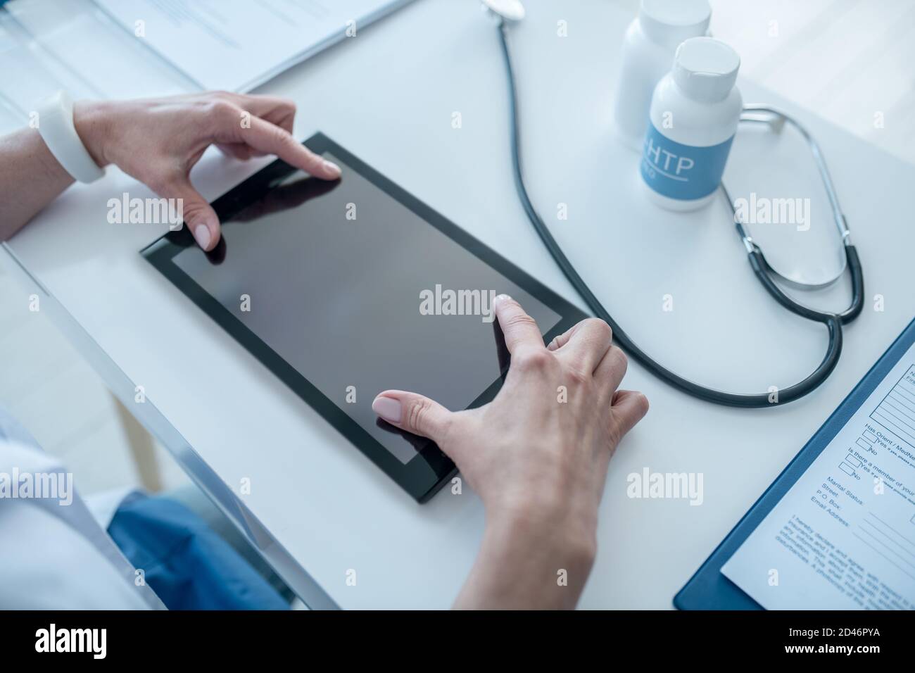 Human hands touching sensor screen on a tablet Stock Photo - Alamy