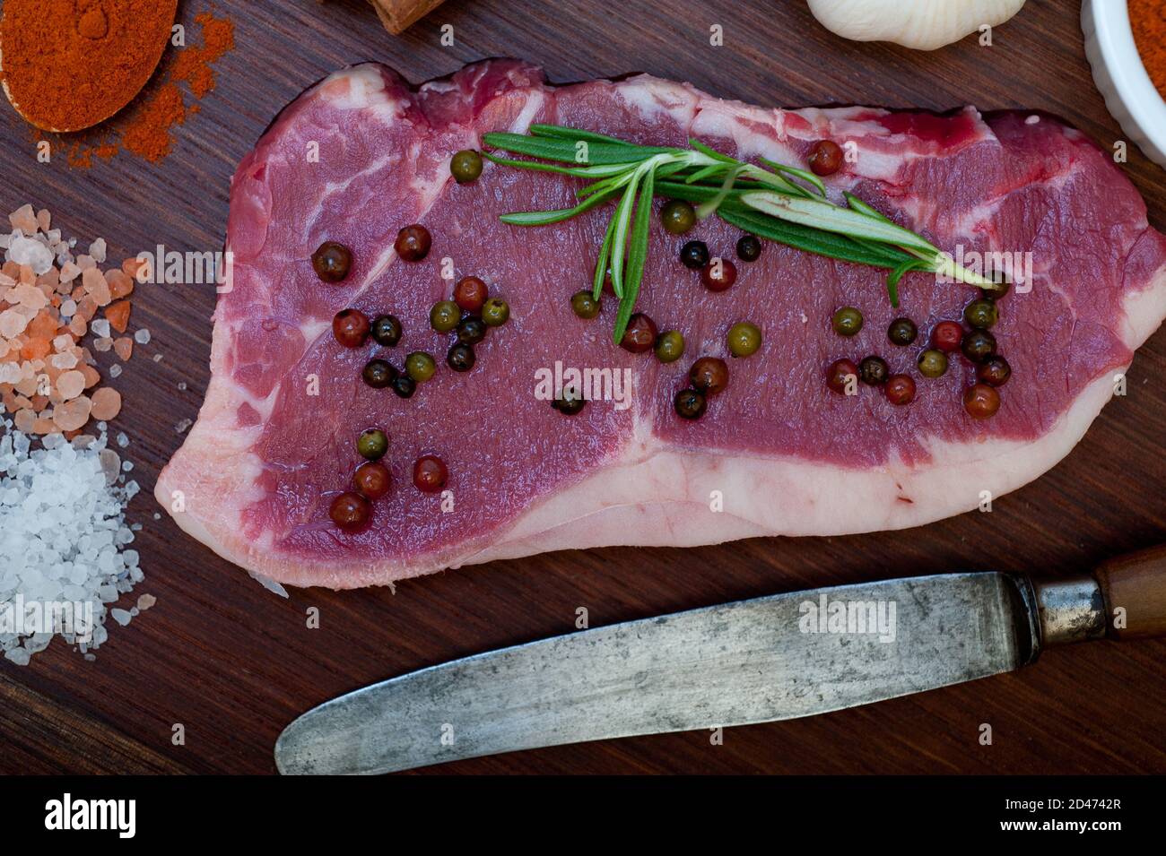 raw uncooked ribeye beef steak butcher selection Stock Photo - Alamy