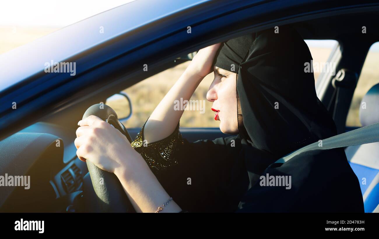 Tired islamic woman in traffic jam, stress headache Stock Photo - Alamy
