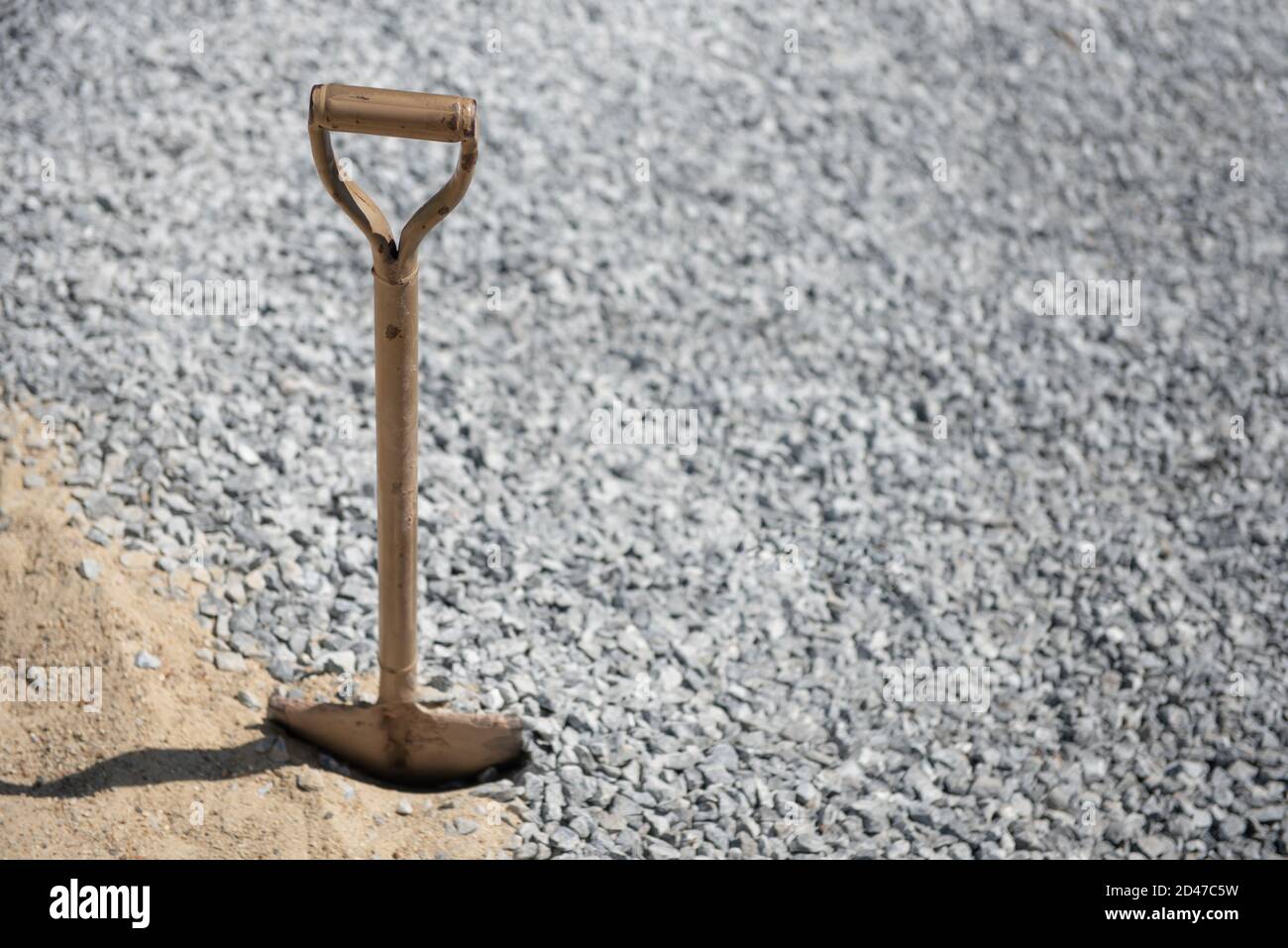 Shovel set on the sand area and crushed stone building materials Stock ...