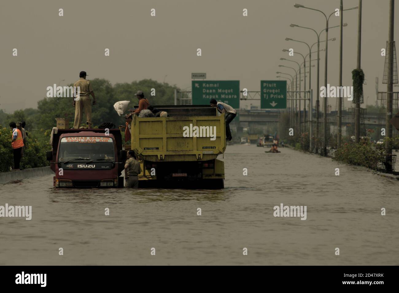 Torrential rain flooding the coastal area of Jakarta, including an ...