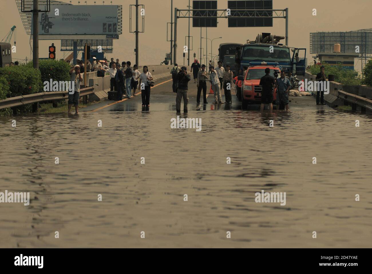 Torrential rain flooding the coastal area of Jakarta, including an ...