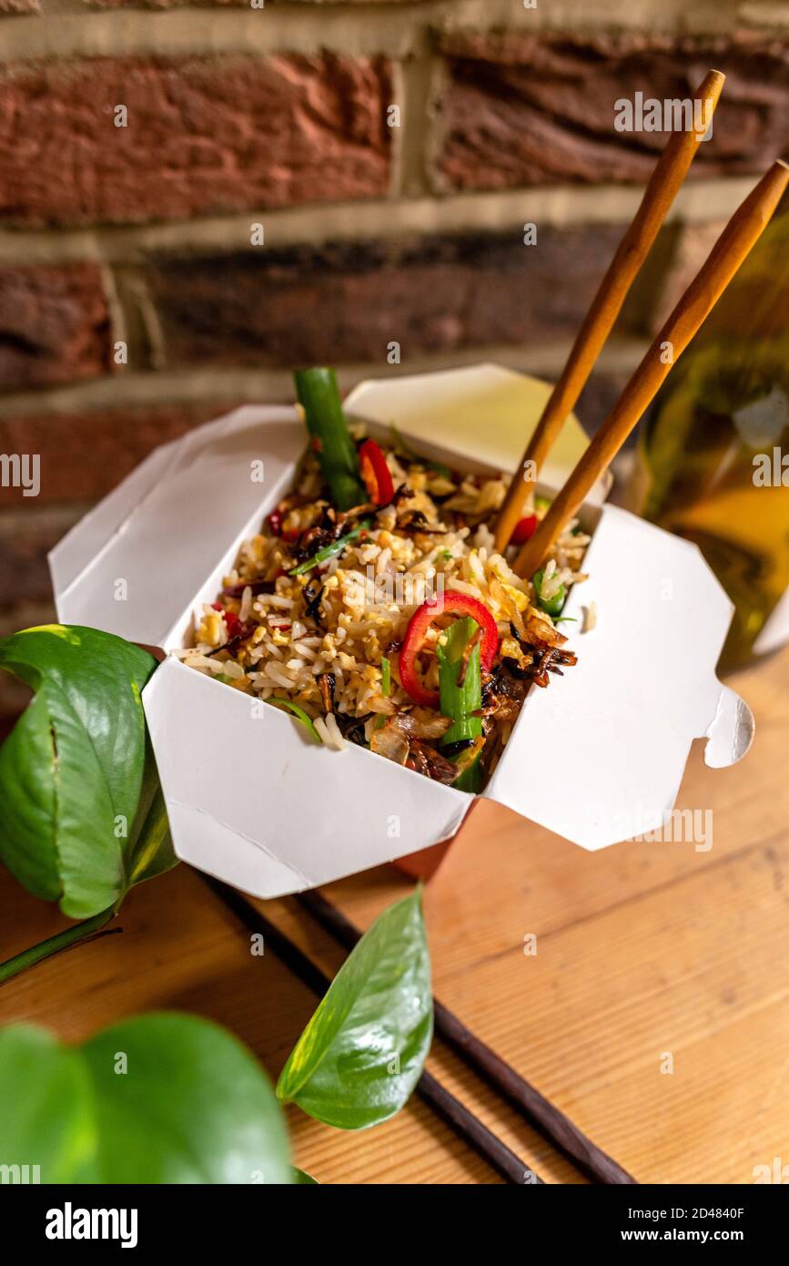 Egg Fried Rice in Cardboard Take Away Container Stock Photo - Alamy